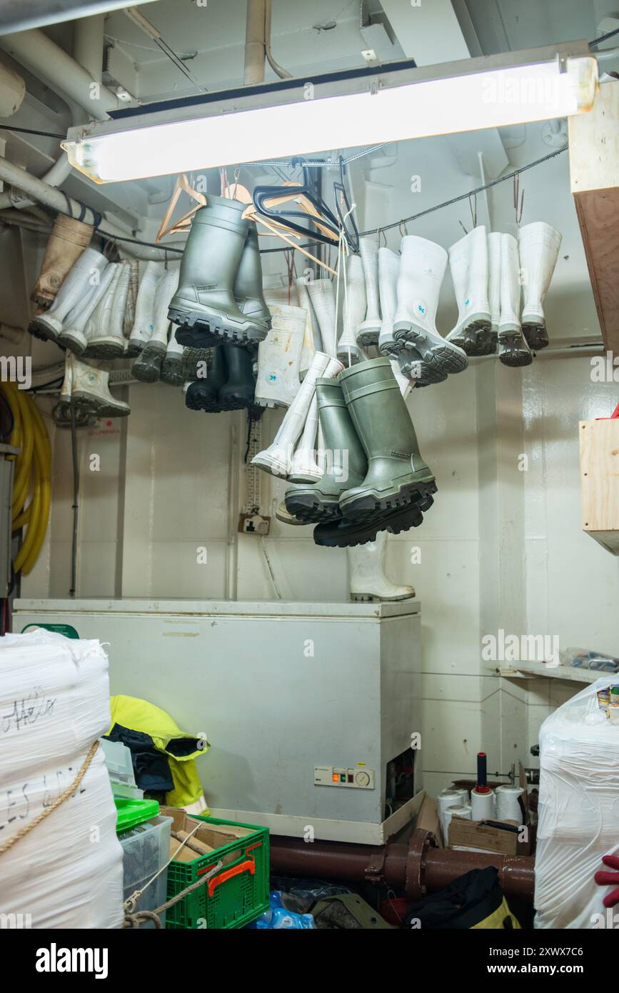Interior view of a boot room on a search and rescue vessel, showcasing ...