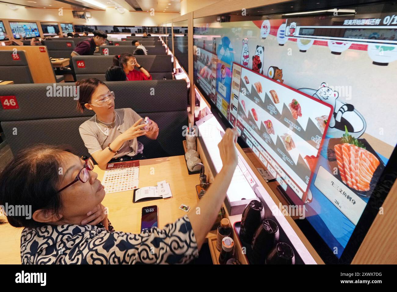 Japan's sushi restaurant chain Sushiro opens its first store in Beijing ...