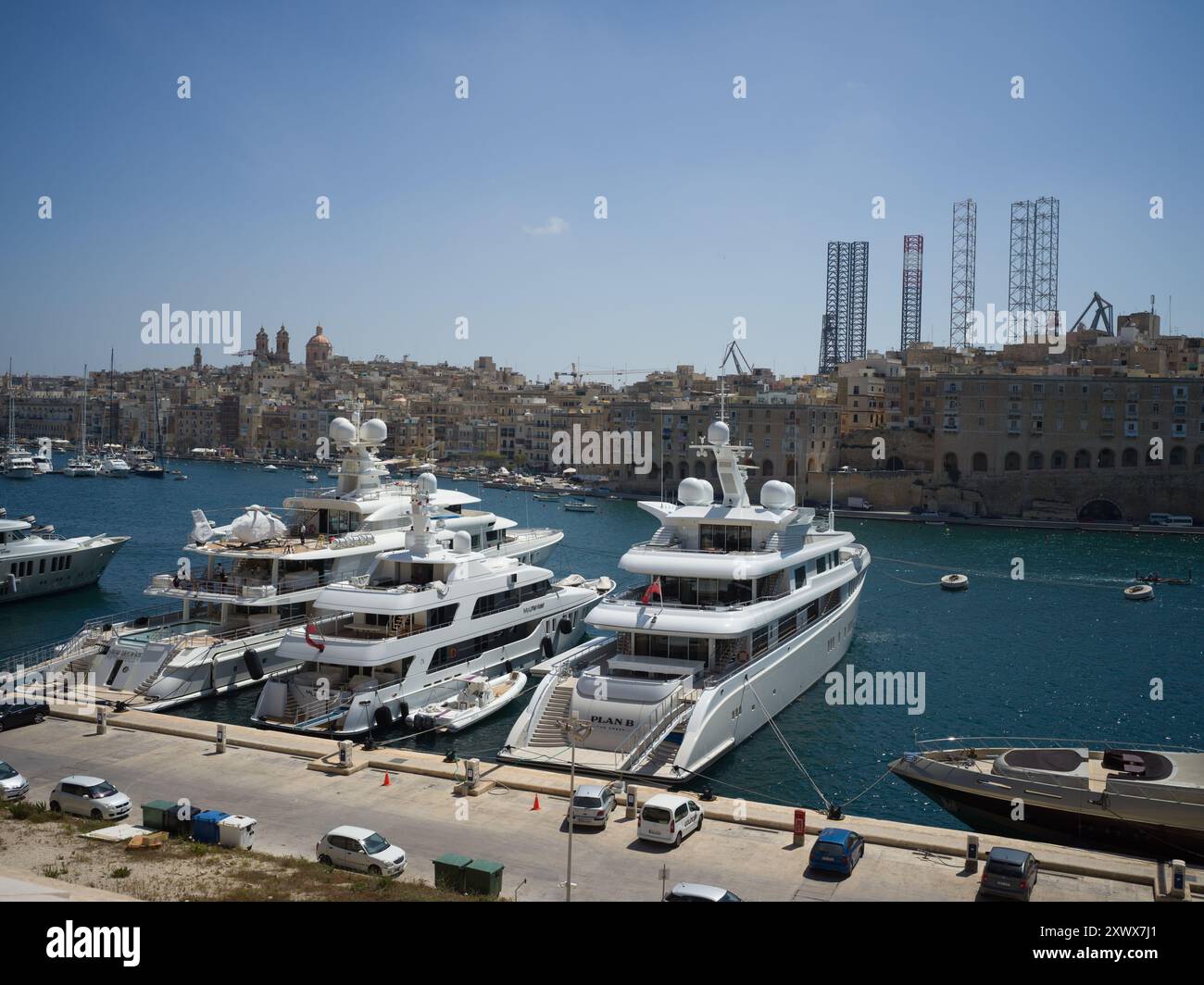 A collection of luxurious yachts docked in the harbor of Malta ...