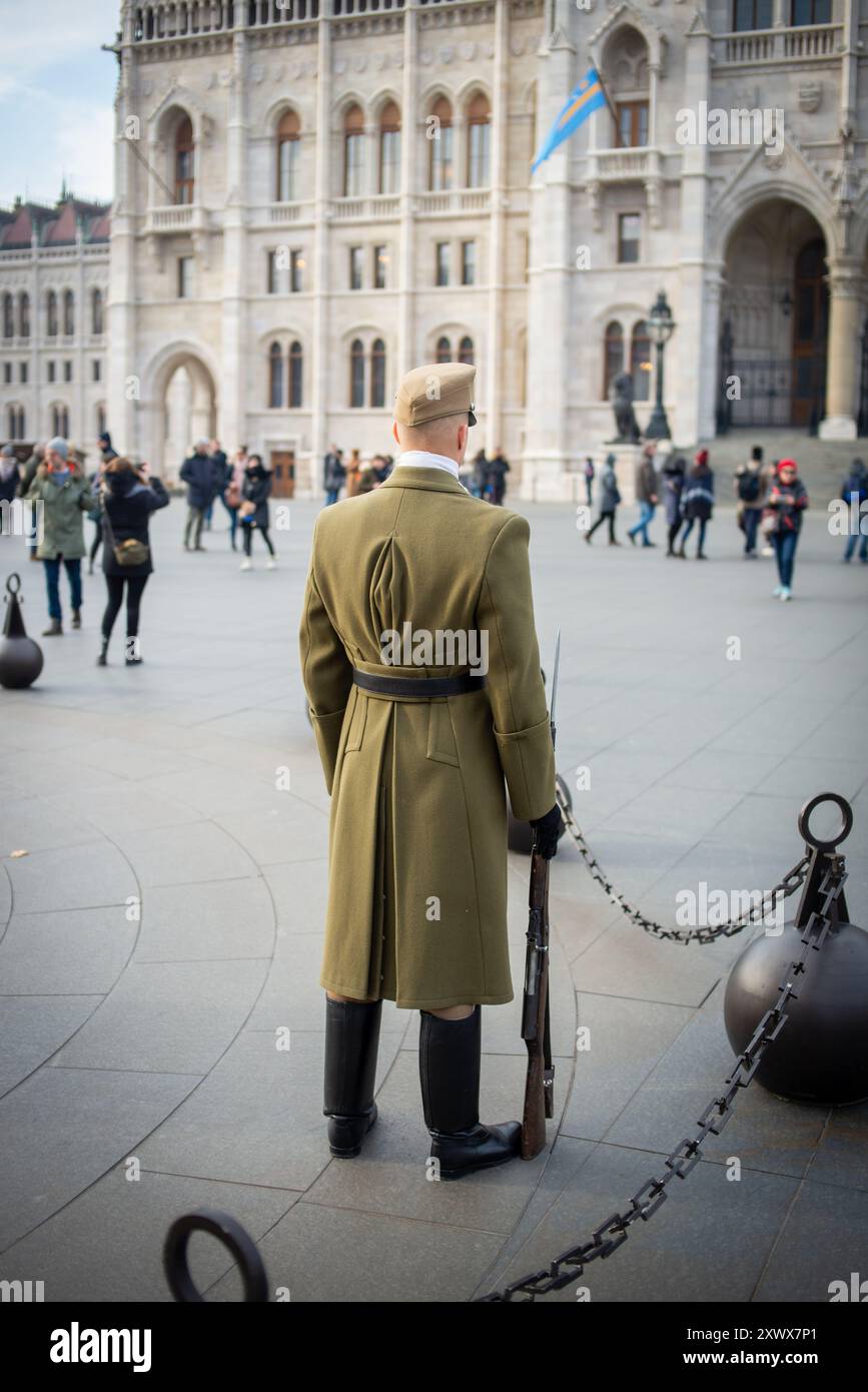 Tourists in front hungarian parliament hi-res stock photography and ...