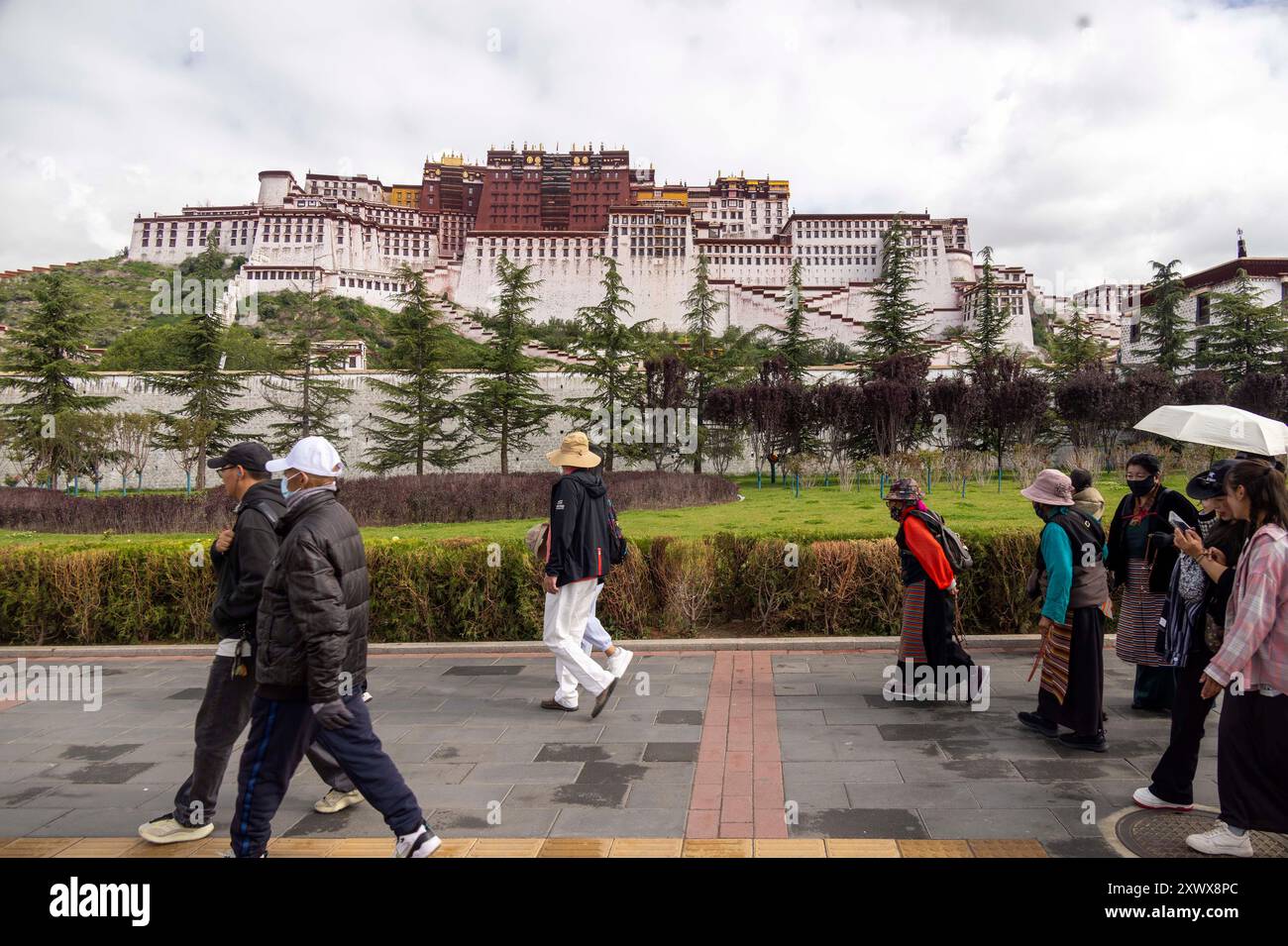 LHASA, CHINA - AUGUST 21, 2024 - Tourists visit the Potala Palace in ...