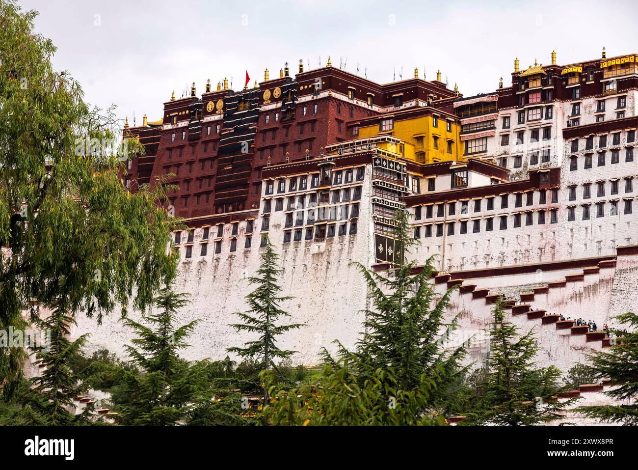 LHASA, CHINA - AUGUST 21, 2024 - Tourists visit the Potala Palace in ...