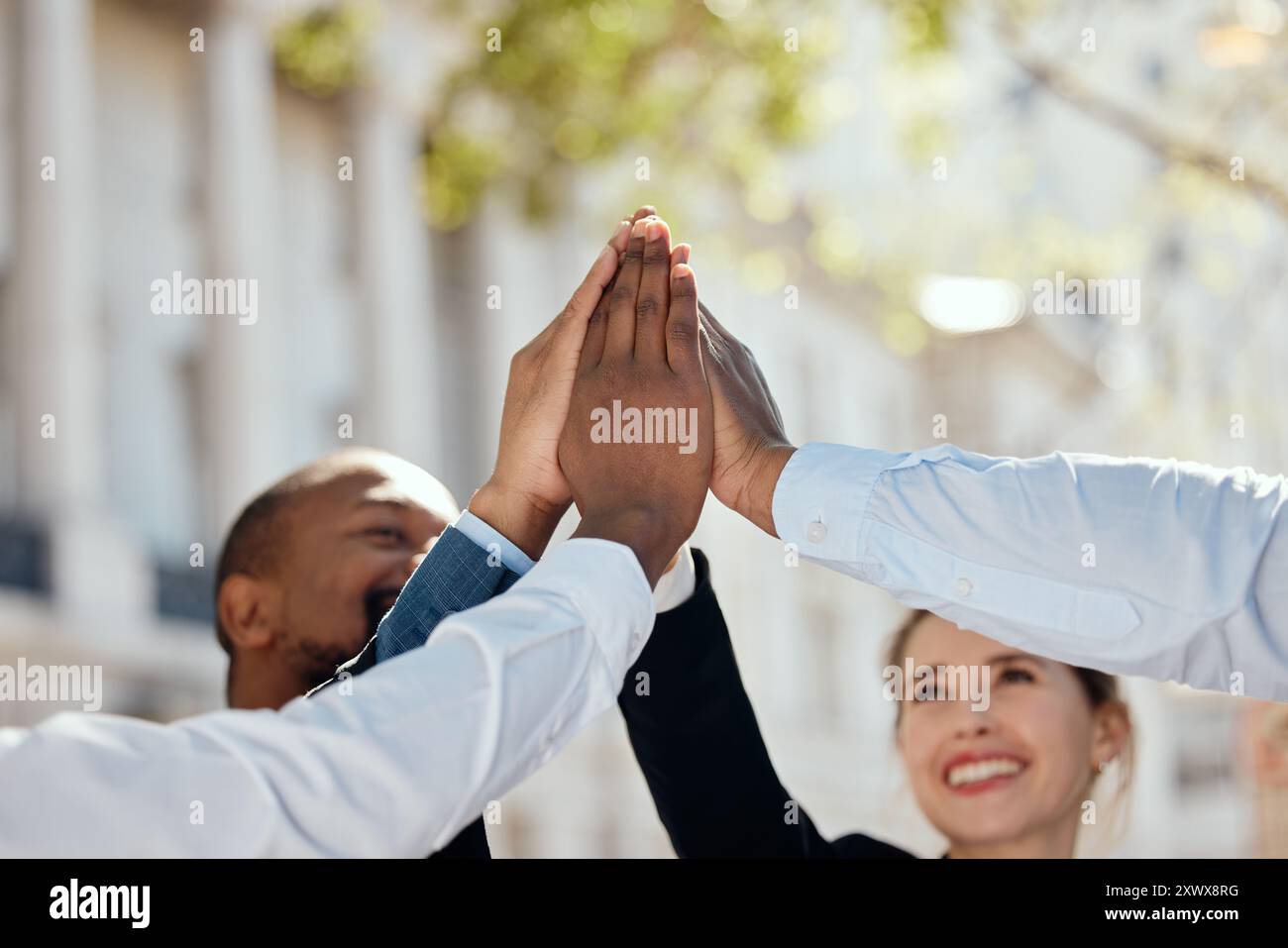 Hands, together and synergy with teamwork, high five and partnership in ...
