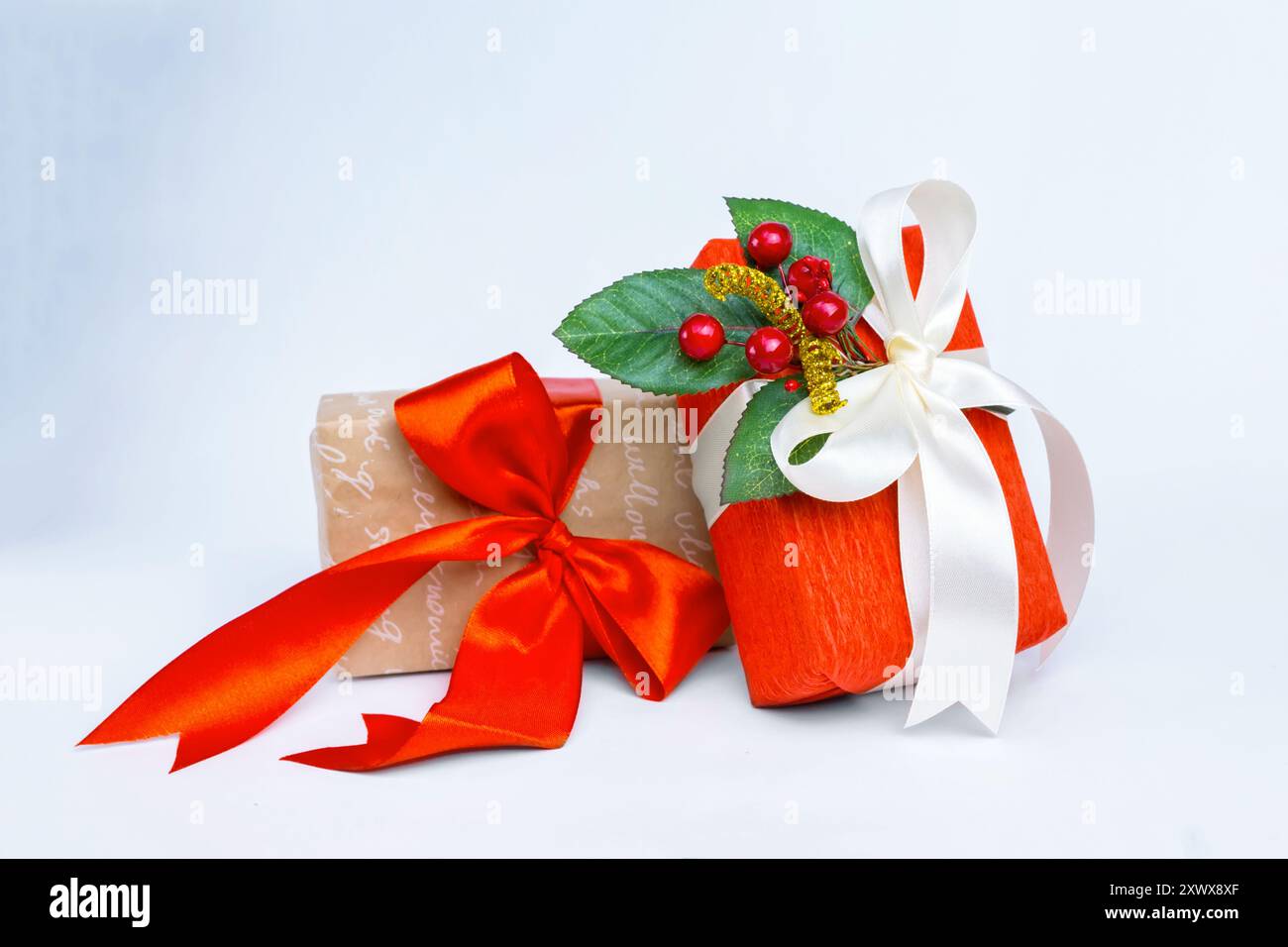 boxes with gifts in beautiful wrappers on a white background Stock ...