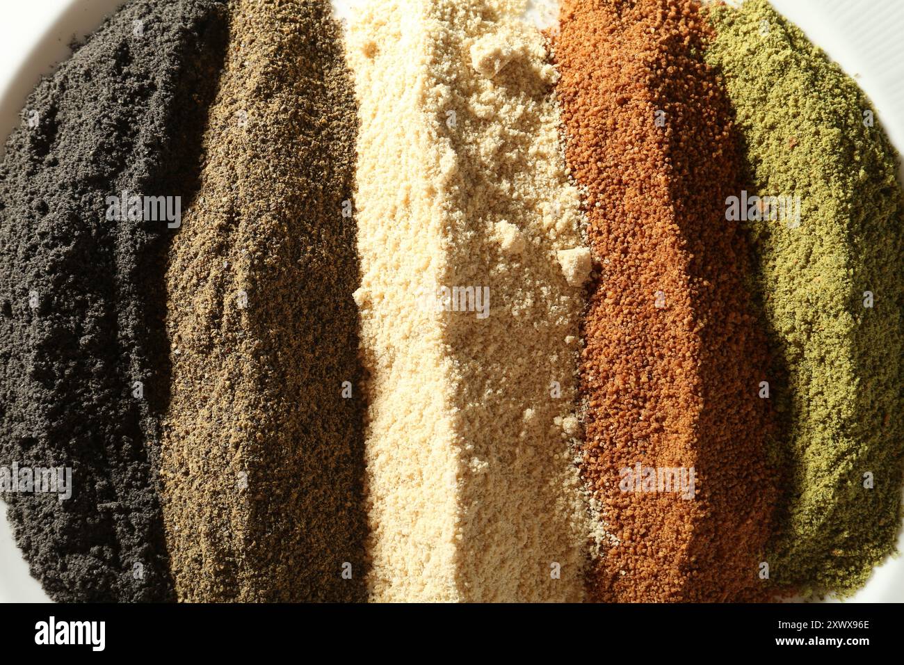 Different superfood powders on plate, closeup view Stock Photo - Alamy