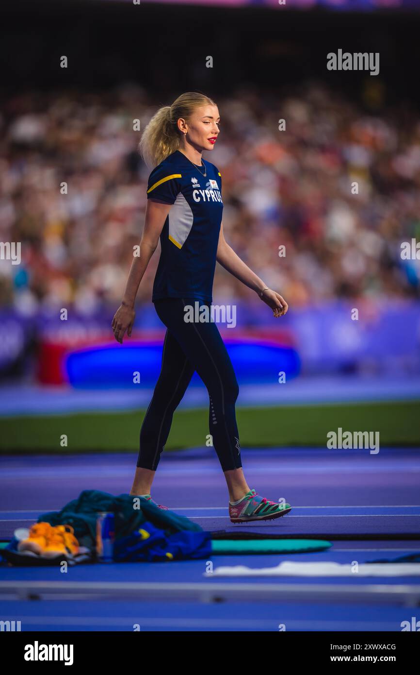 Elena Kulichenko participating in the high jump at the Paris 2024 ...