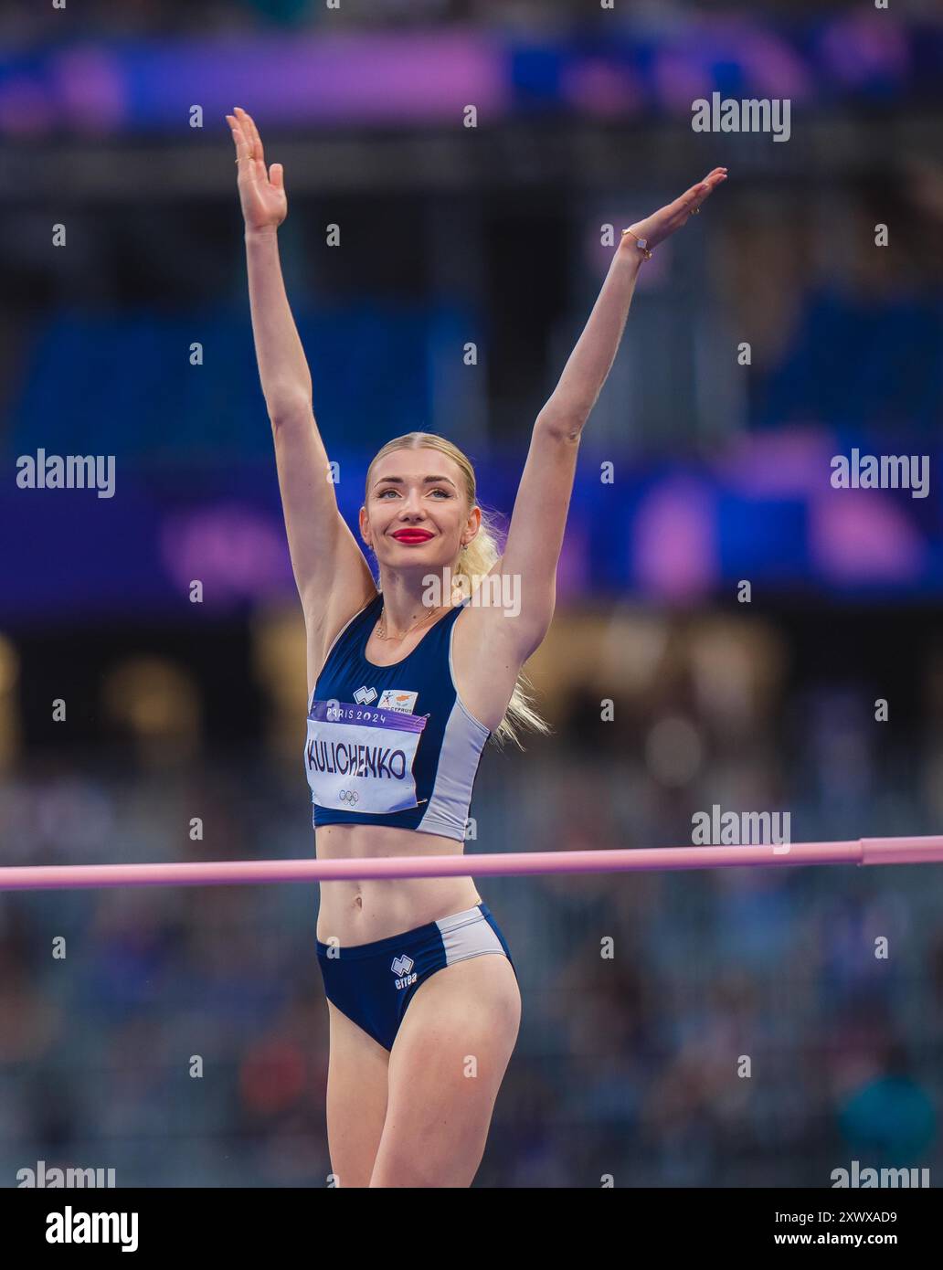 Elena Kulichenko participating in the high jump at the Paris 2024 ...
