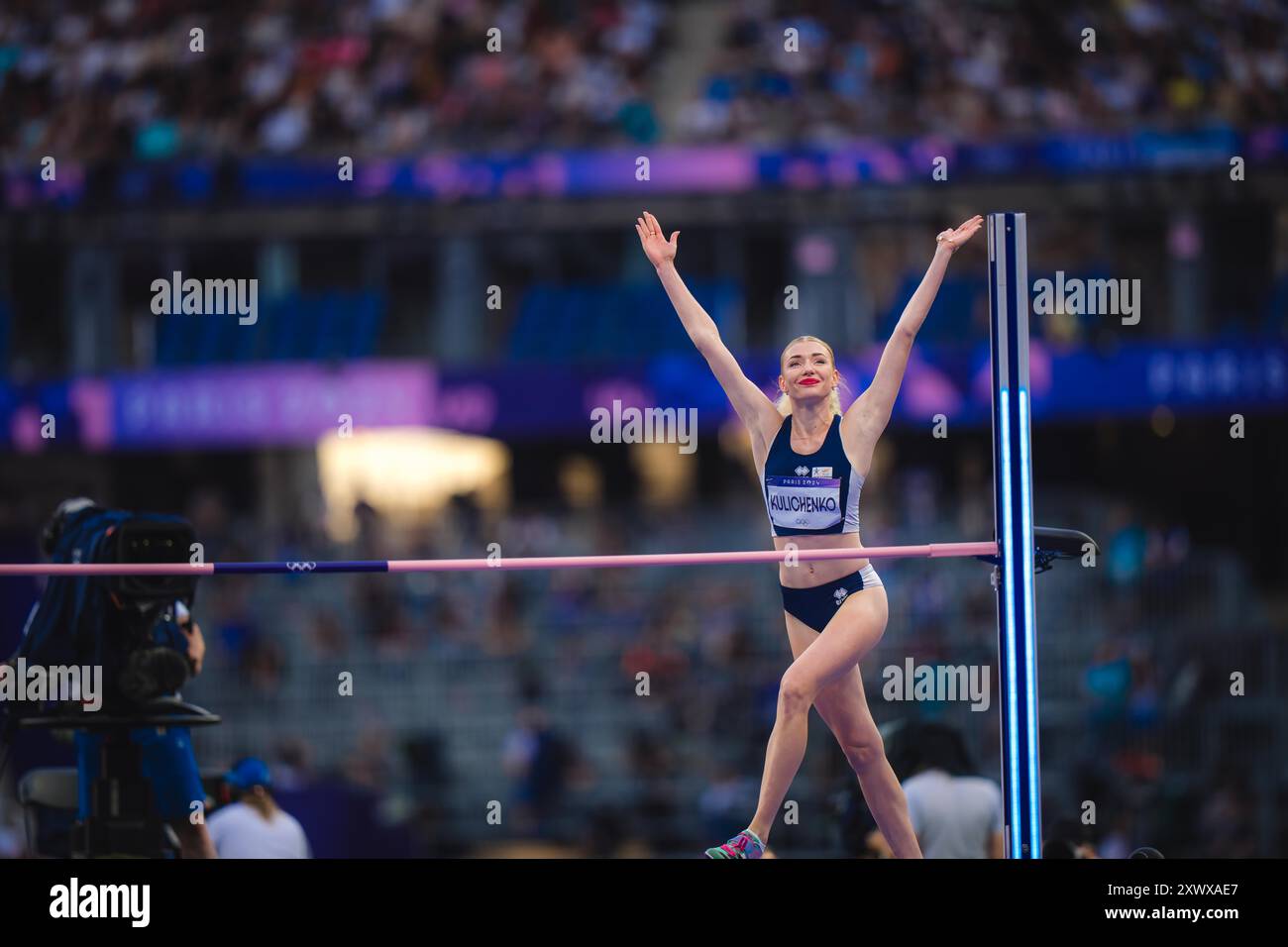 Elena Kulichenko participating in the high jump at the Paris 2024 ...
