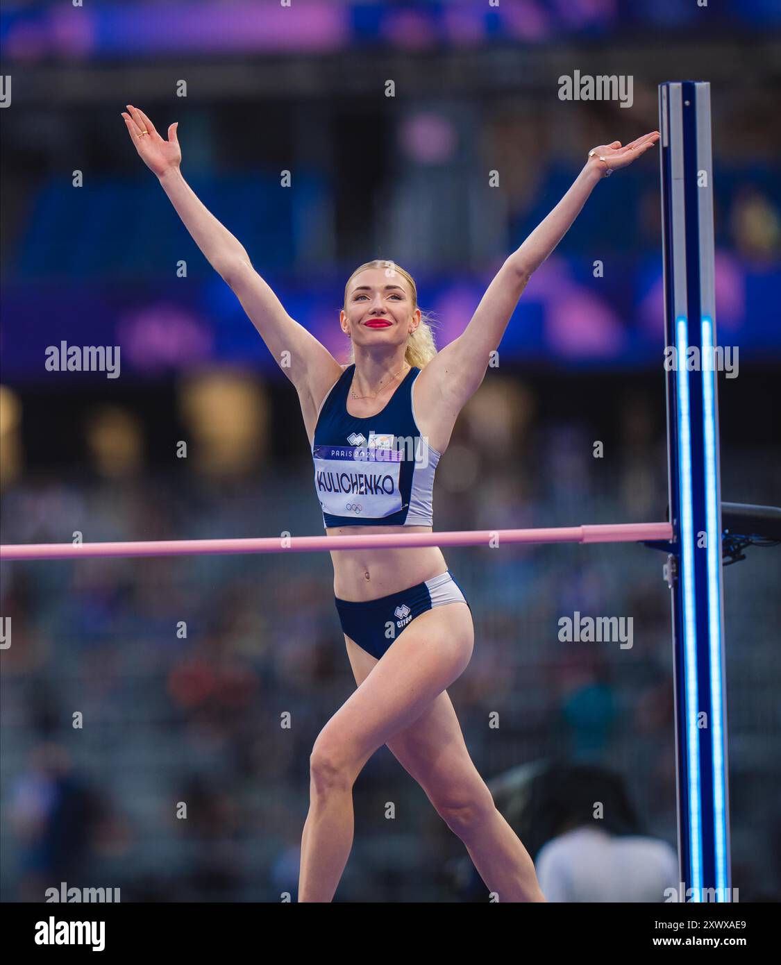 Elena Kulichenko participating in the high jump at the Paris 2024 ...