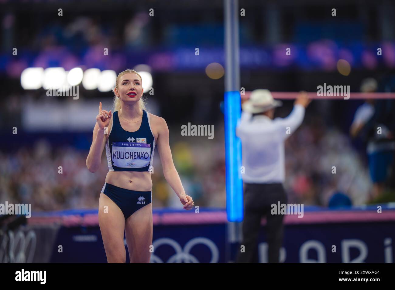 Elena Kulichenko participating in the high jump at the Paris 2024 ...