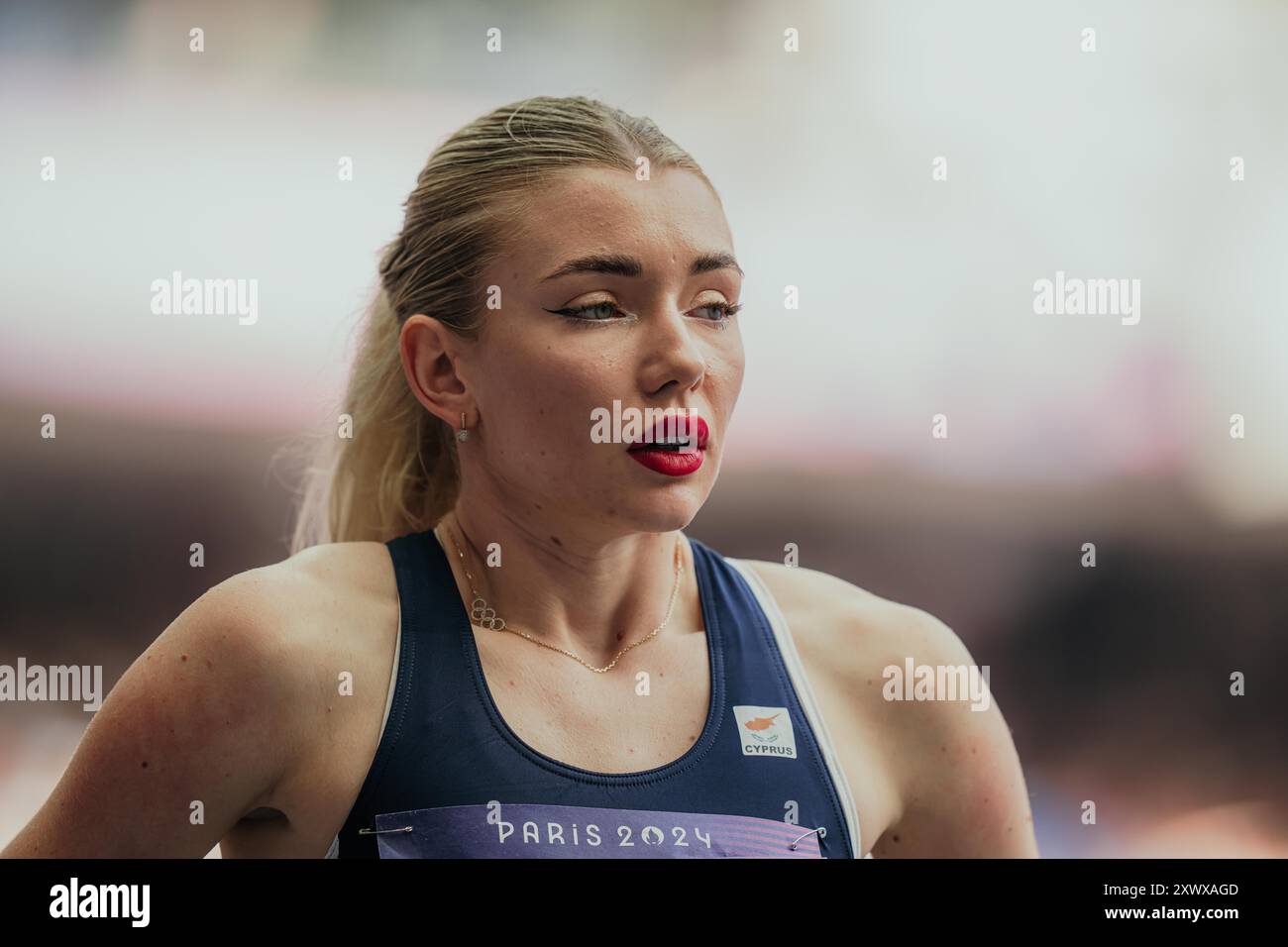 Elena Kulichenko participating in the high jump at the Paris 2024 ...