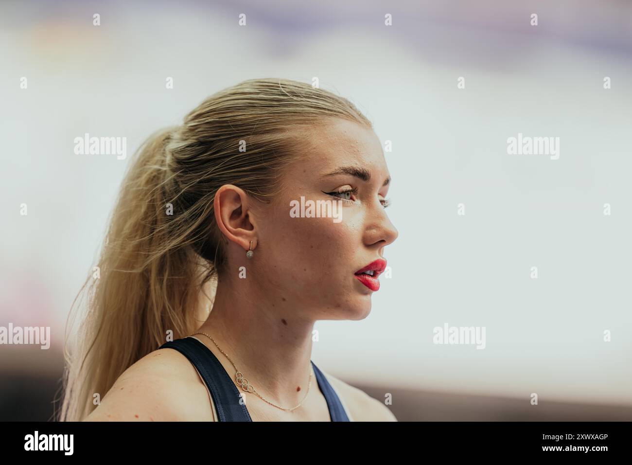 Elena Kulichenko participating in the high jump at the Paris 2024 ...