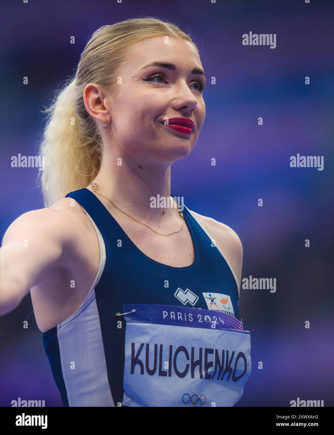 Elena Kulichenko participating in the high jump at the Paris 2024 ...