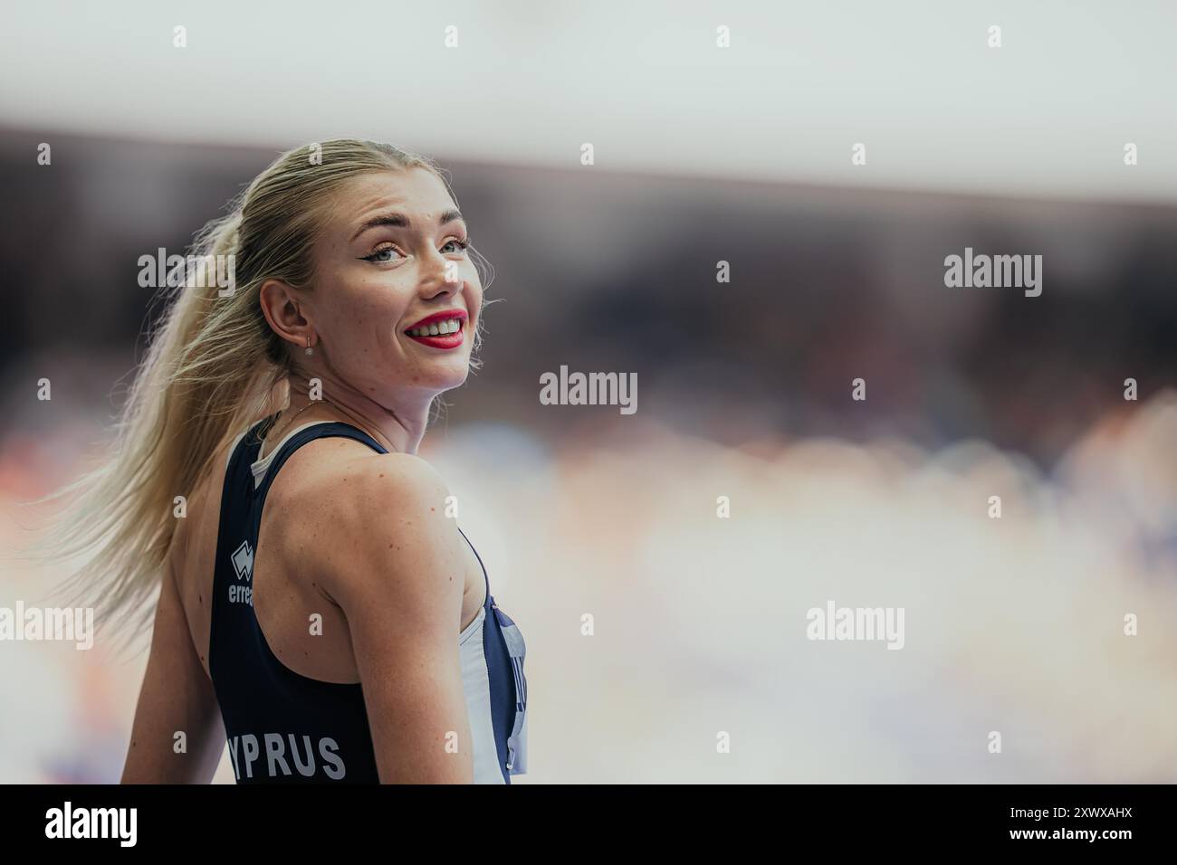 Elena Kulichenko participating in the high jump at the Paris 2024 ...