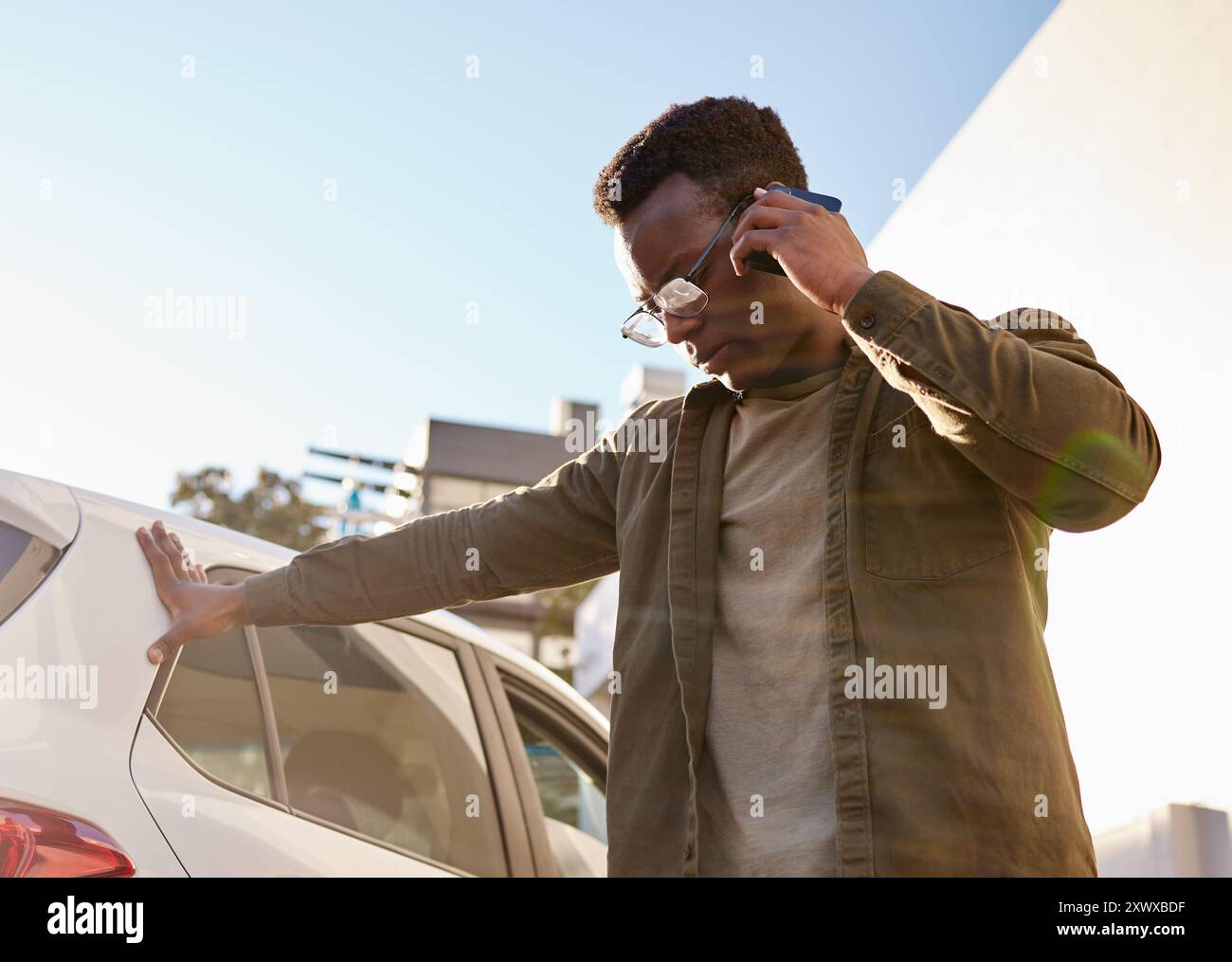 Breakdown, phone call an vehicle with black man outdoor to contact ...