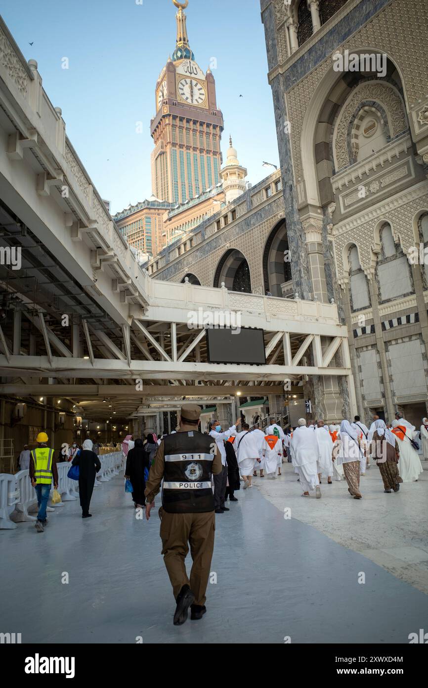 Mecca, Saudi Arabia - June 5, 2024: A Saudi Arabia Police walking near the Al Haram Mosque ...