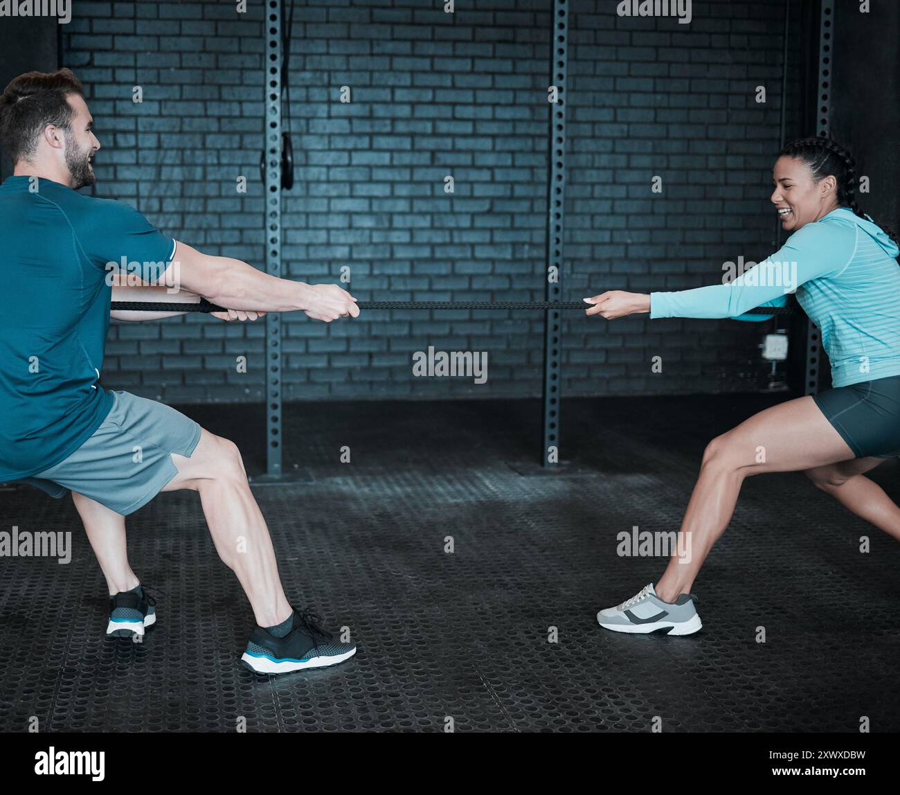 Fitness, pull and rope with friends in gym together for tug of war ...