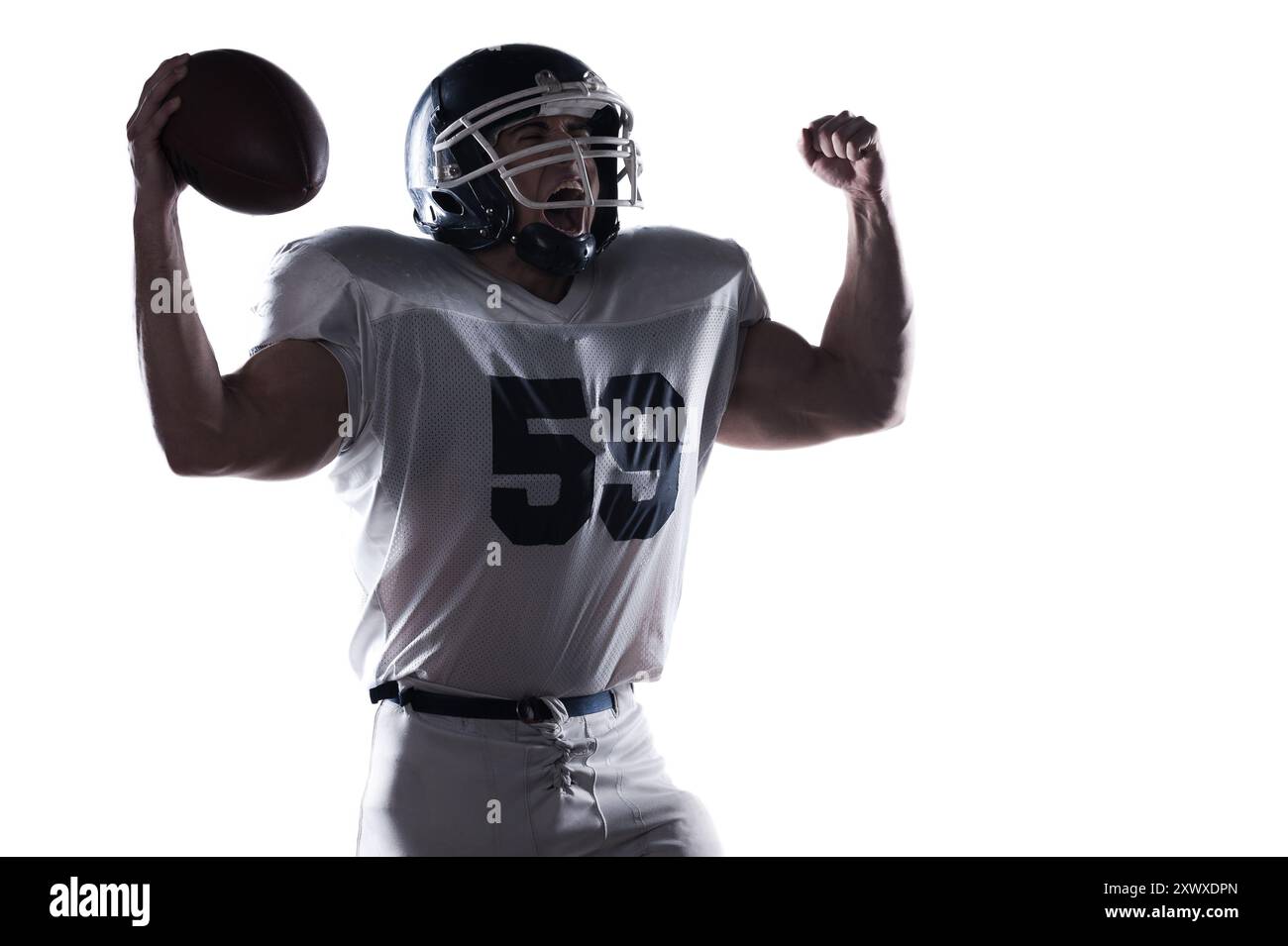 Emotions going wild. American football player screaming and keeping ...