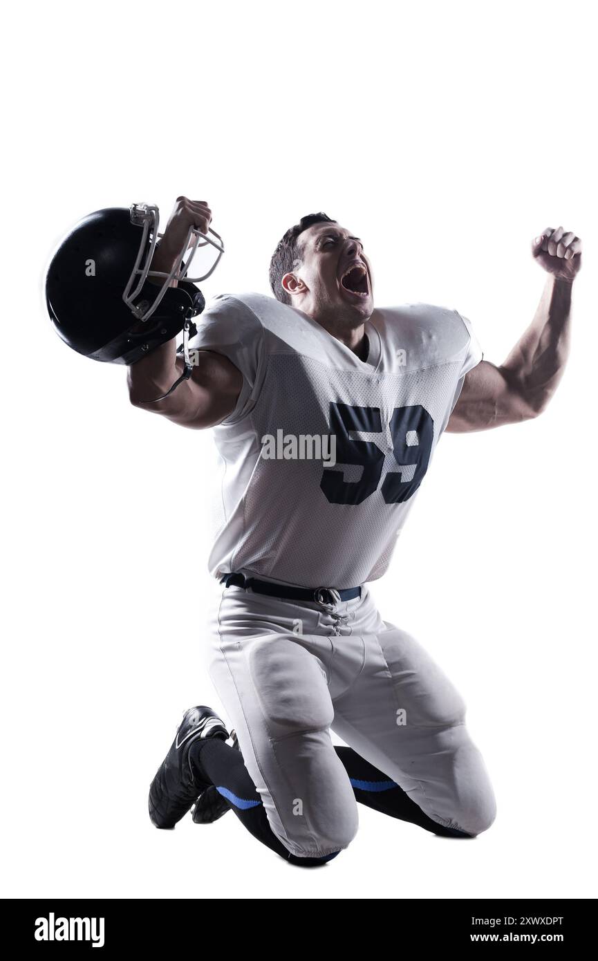 Wild emotions. American football player screaming and keeping arms ...