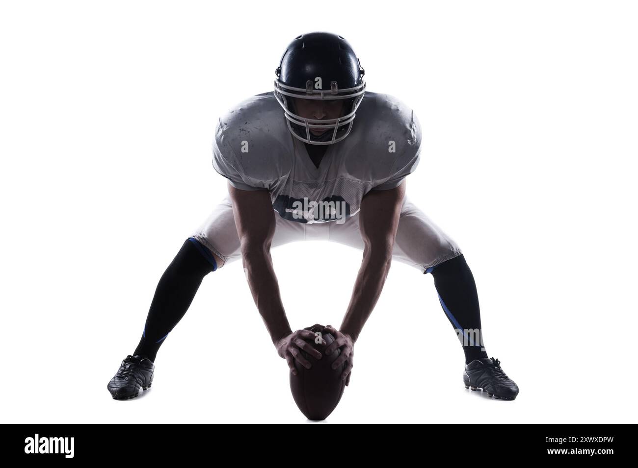 Starting the game. American football player getting ready before ...