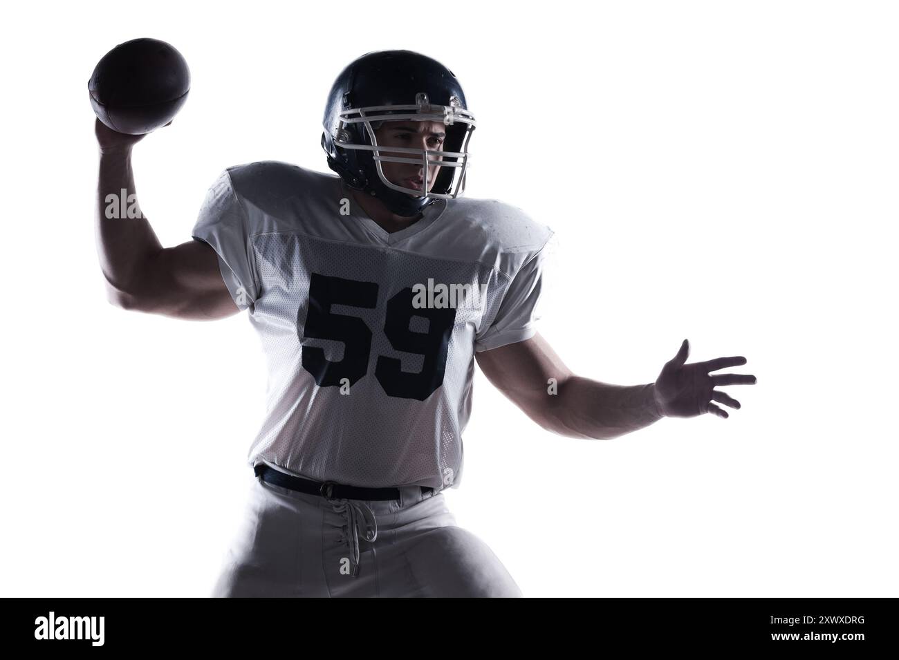 American football player throwing ball hi-res stock photography and ...