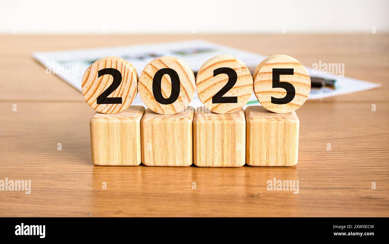 Business concept of 2025 new year symbol. Beautiful wooden circles with ...
