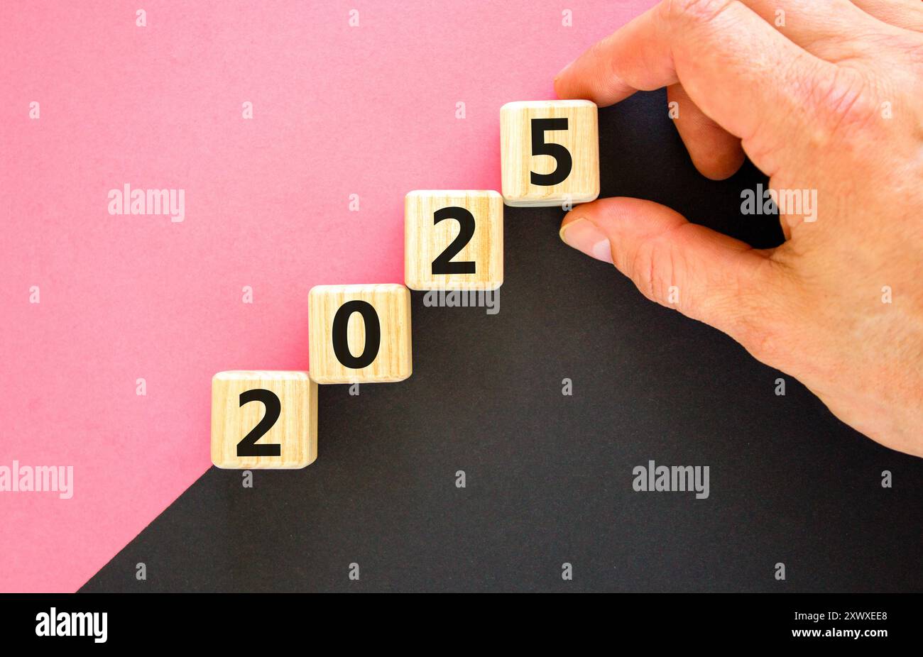 Business concept of 2025 new year symbol. Beautiful wooden cubes with ...