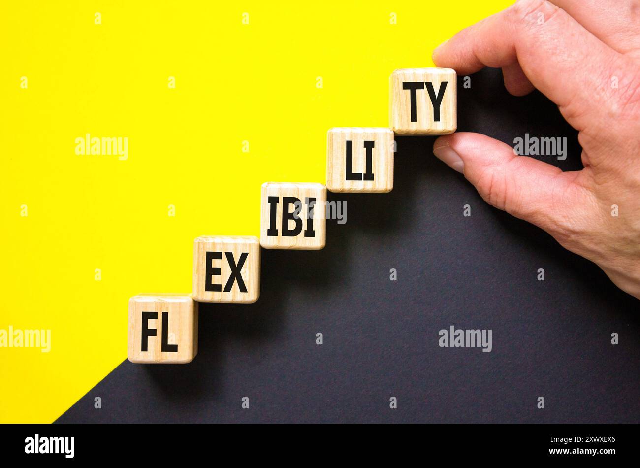 Flexibility symbol. Concept word Flexibility on beautiful wooden cubes ...