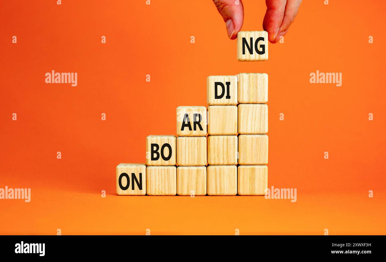 Onboarding success symbol. Concept word Onboarding on wooden cubes ...