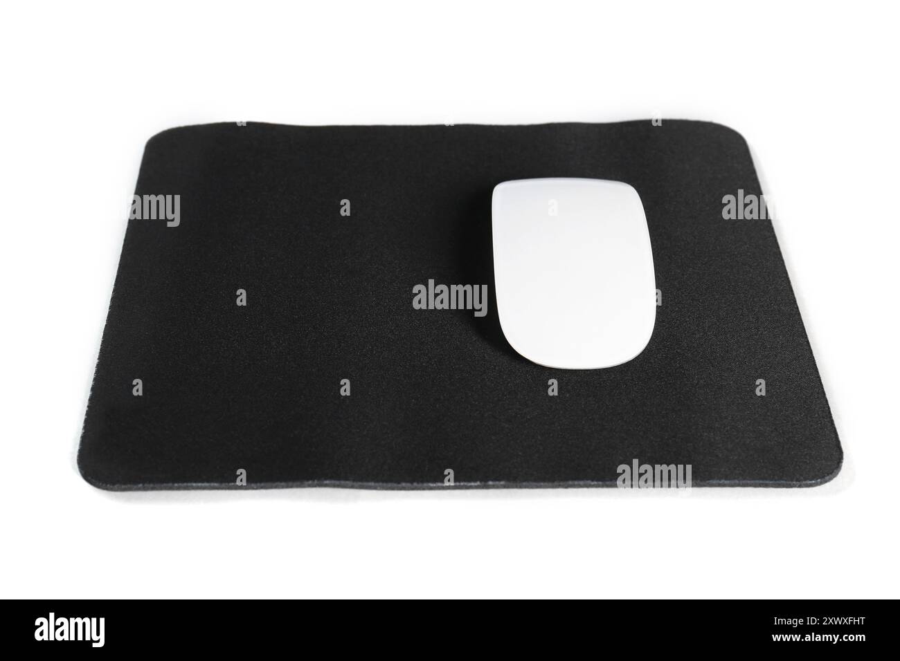 Wireless mouse and mousepad on white background Stock Photo - Alamy