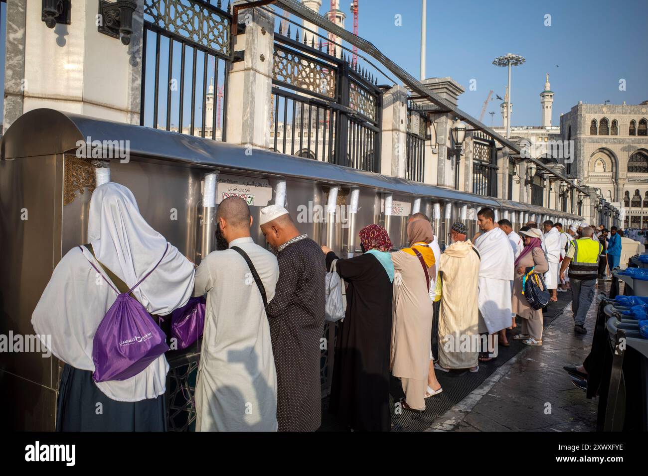 Mecca, Saudi Arabia - June 5, 2024: Hajj and Umrah pilgrims drinking ...