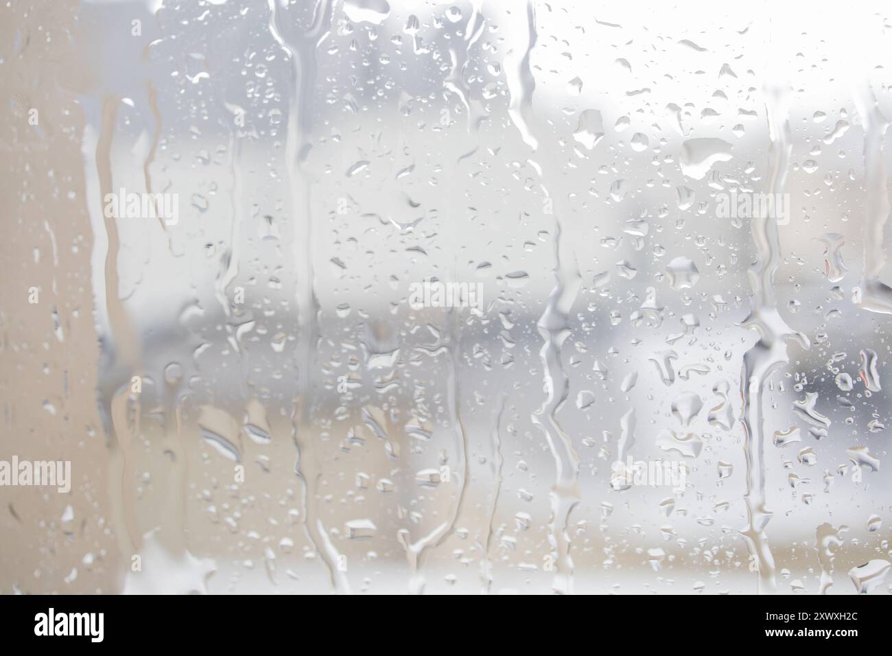 Rain drops on the window close up background Stock Photo - Alamy