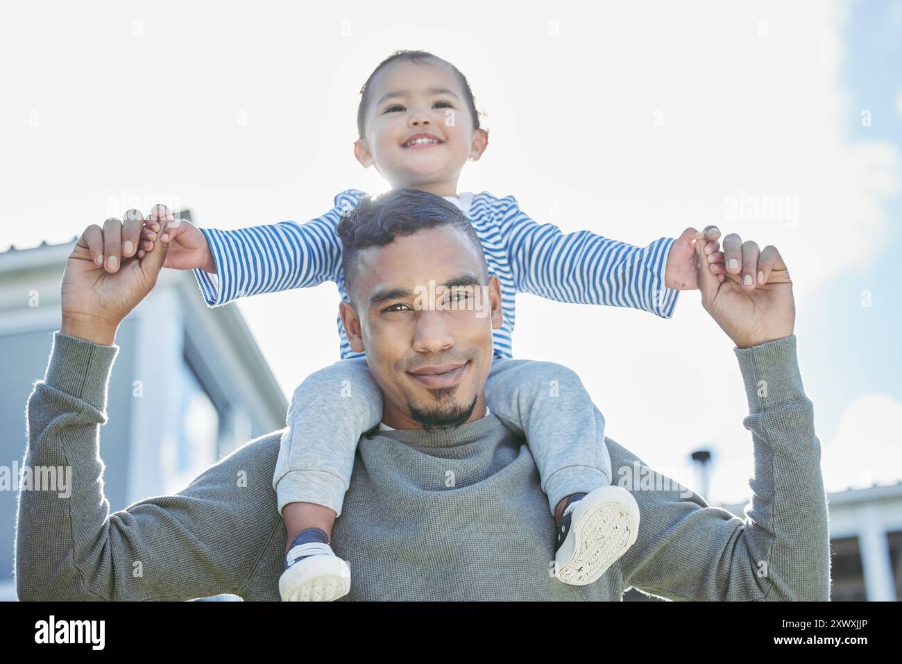 Portrait, dad, and child for carry on shoulder, connection and bonding ...