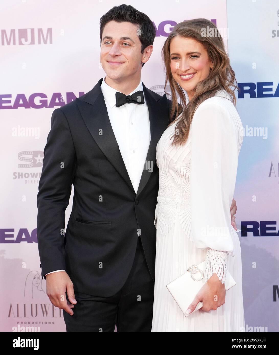 Los Angeles, USA. 20th Aug, 2024. (L-R) David Henrie and Maria Cahill ...