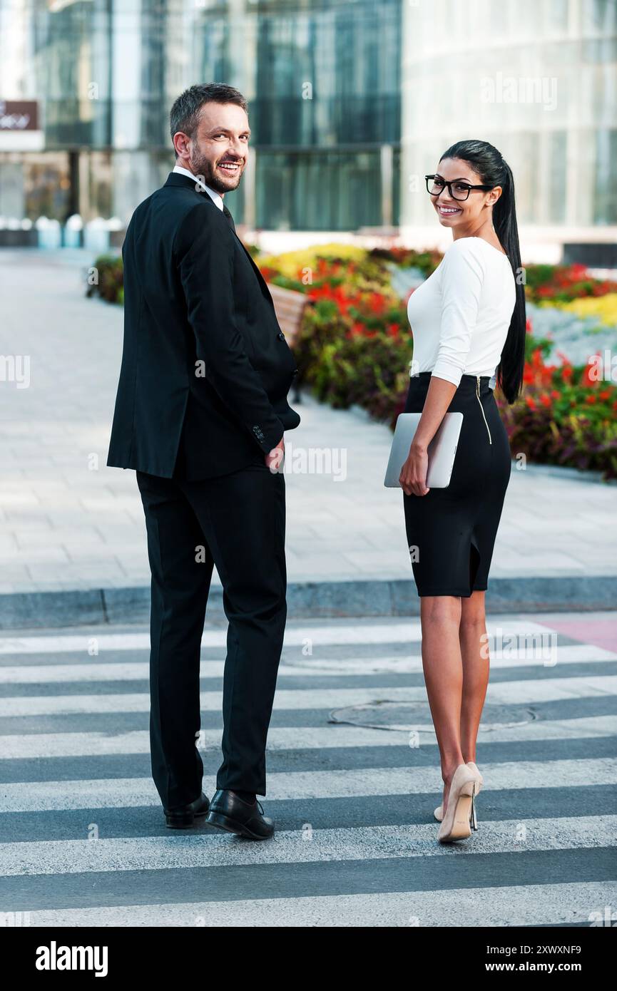 Ready for this workday. Full length of two smiling business people ...