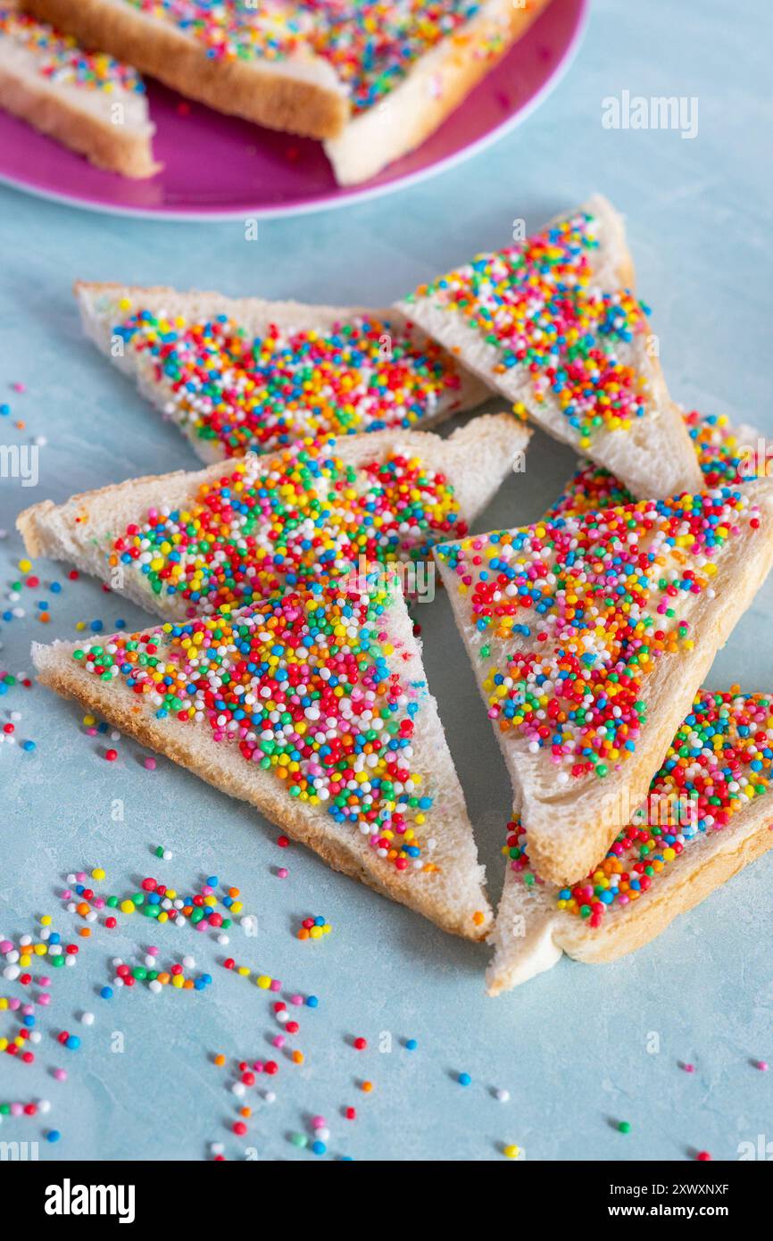 Slices of fairy bread which is a traditional Australian party food Stock Photo - Alamy