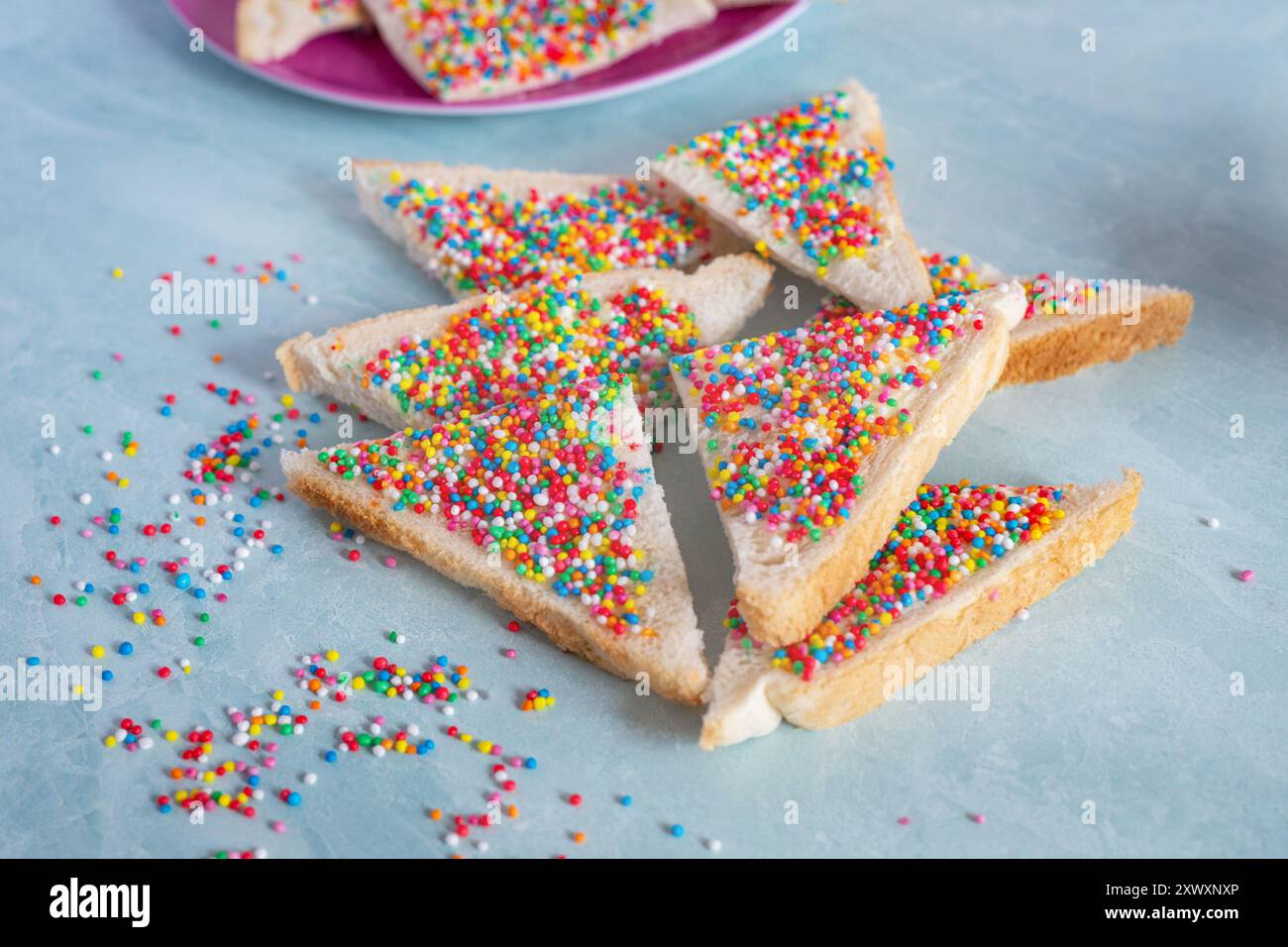 Slices of fairy bread which is a traditional Australian party food Stock Photo - Alamy