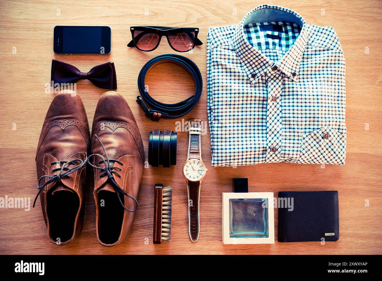 The most important things. Top view of clothing and diverse personal ...