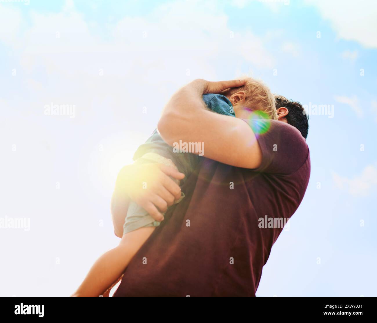 Sky, hug and dad holding child for bonding, comfort and development for ...