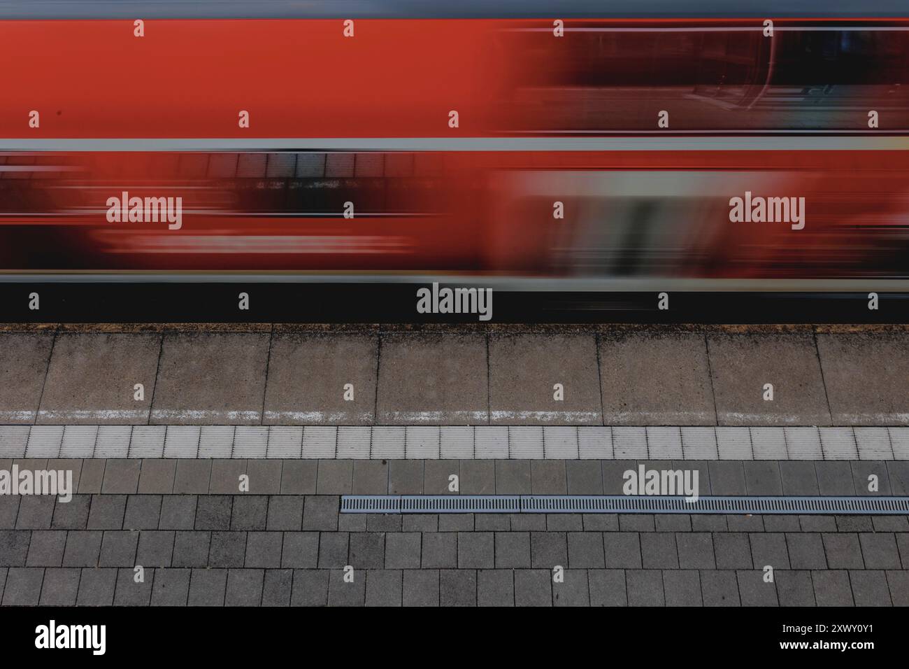 Wustermark, Deutschland. 20th Aug, 2024. A regional train is emerging ...