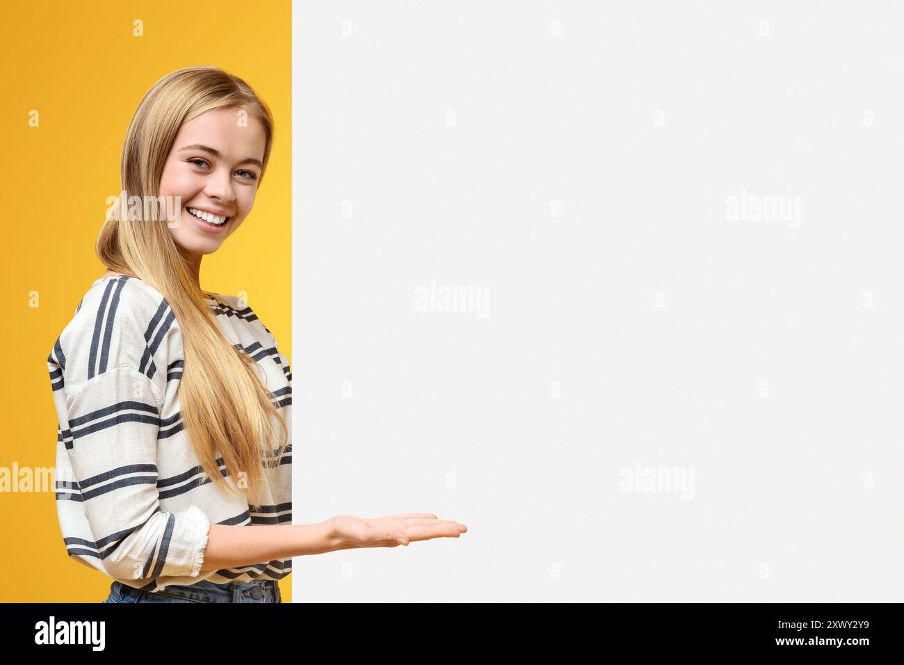 Beautiful girl pointing at white blank placard with open palm Stock ...