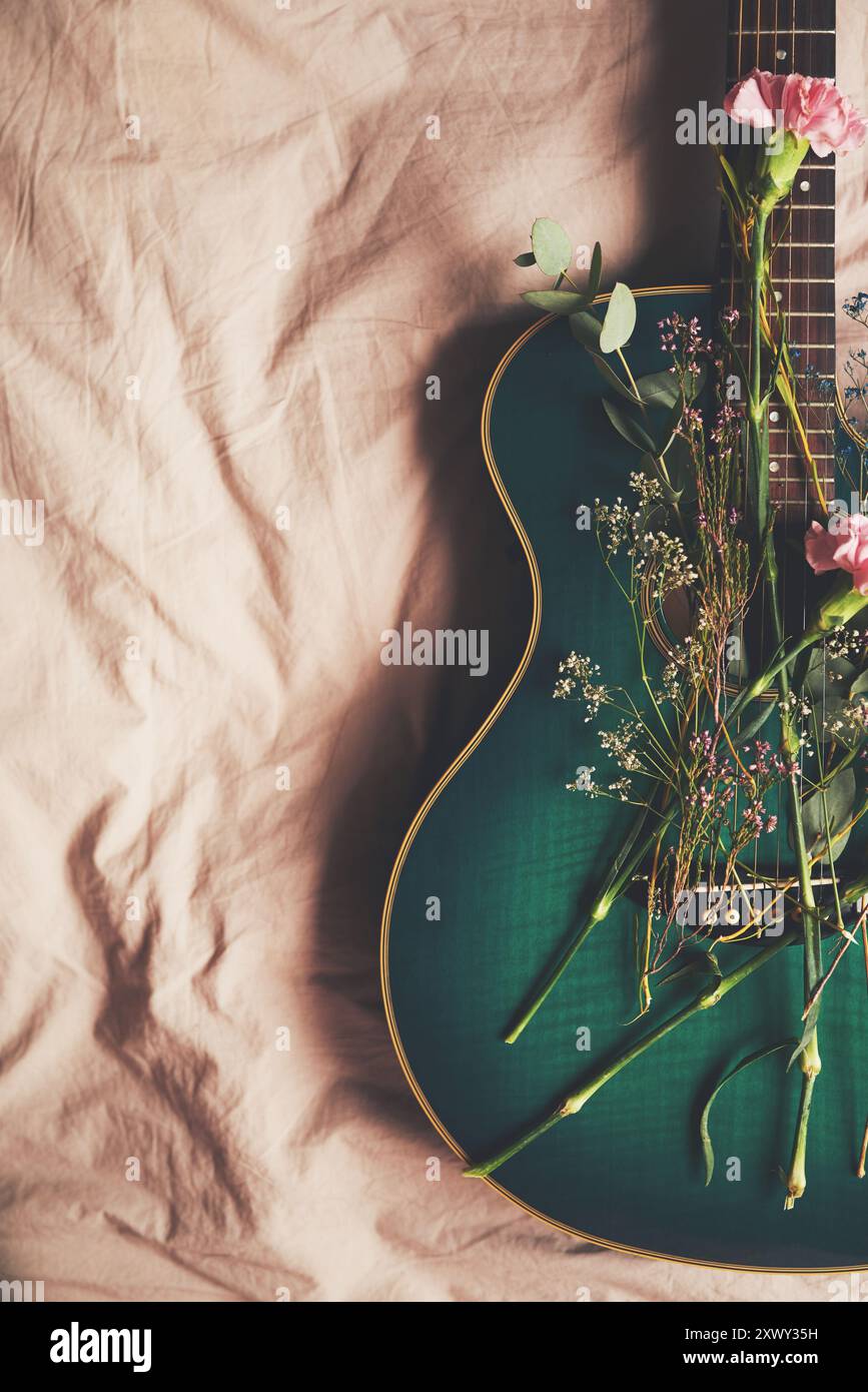 Decoration, instrument and guitar with flowers in home, green and ...