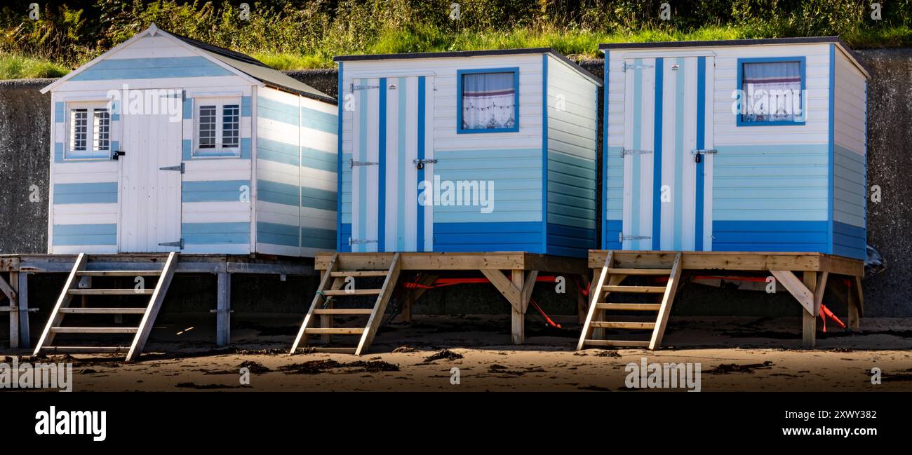 Raised beach huts in North Wales Stock Photo - Alamy