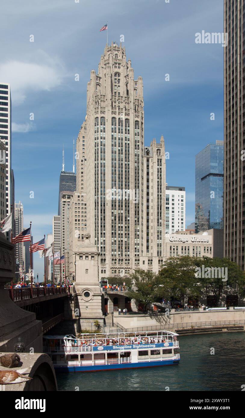 The iconic Tribune Tower modern architecture building, a tourboat on ...