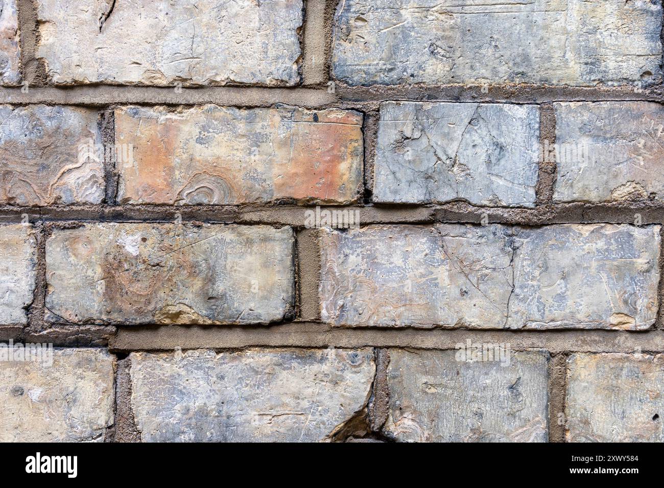 Old grey brick wall hi-res stock photography and images - Alamy