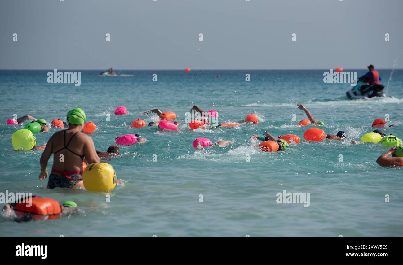Athletes running in the sea to swim free style. Swimming race ...