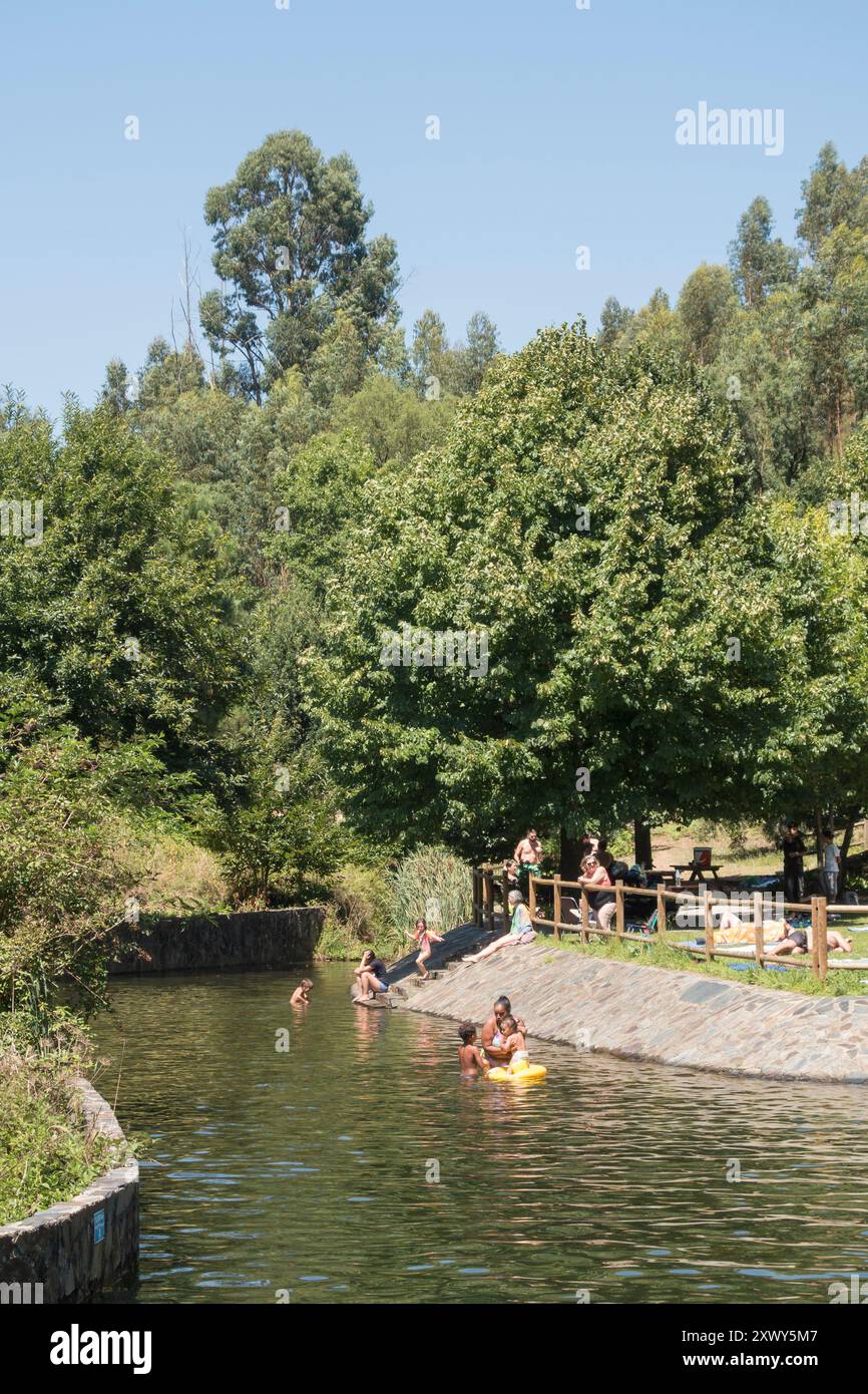 A busy river beach (praia fluvial) at Aldeia Ana de Aviz, near Figueiró ...