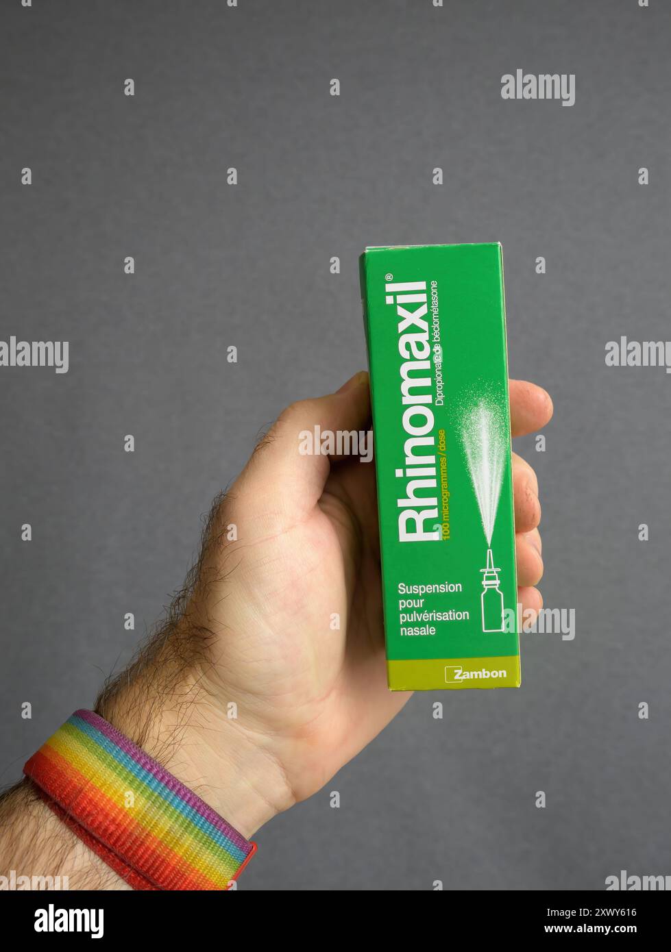 Paris, France - Dec 24, 2024: A hand holds a green Rhinomaxil nasal ...