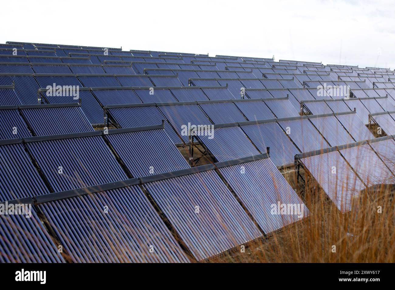 Solar panels field at electrical power generation station Stock Photo ...