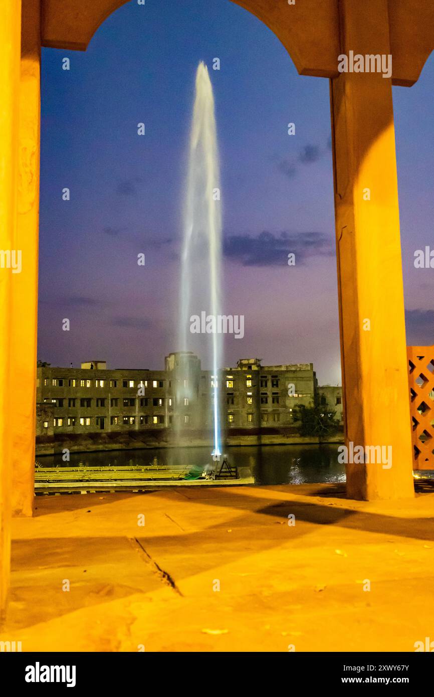 water fountain with long water throw with dramatic sky at evening Stock ...